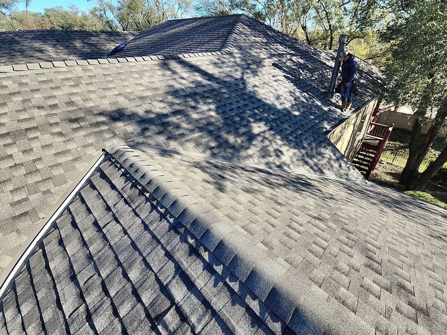 How to Replace Loose or Missing Ridge Cap Shingles - Rhoden Roofing
