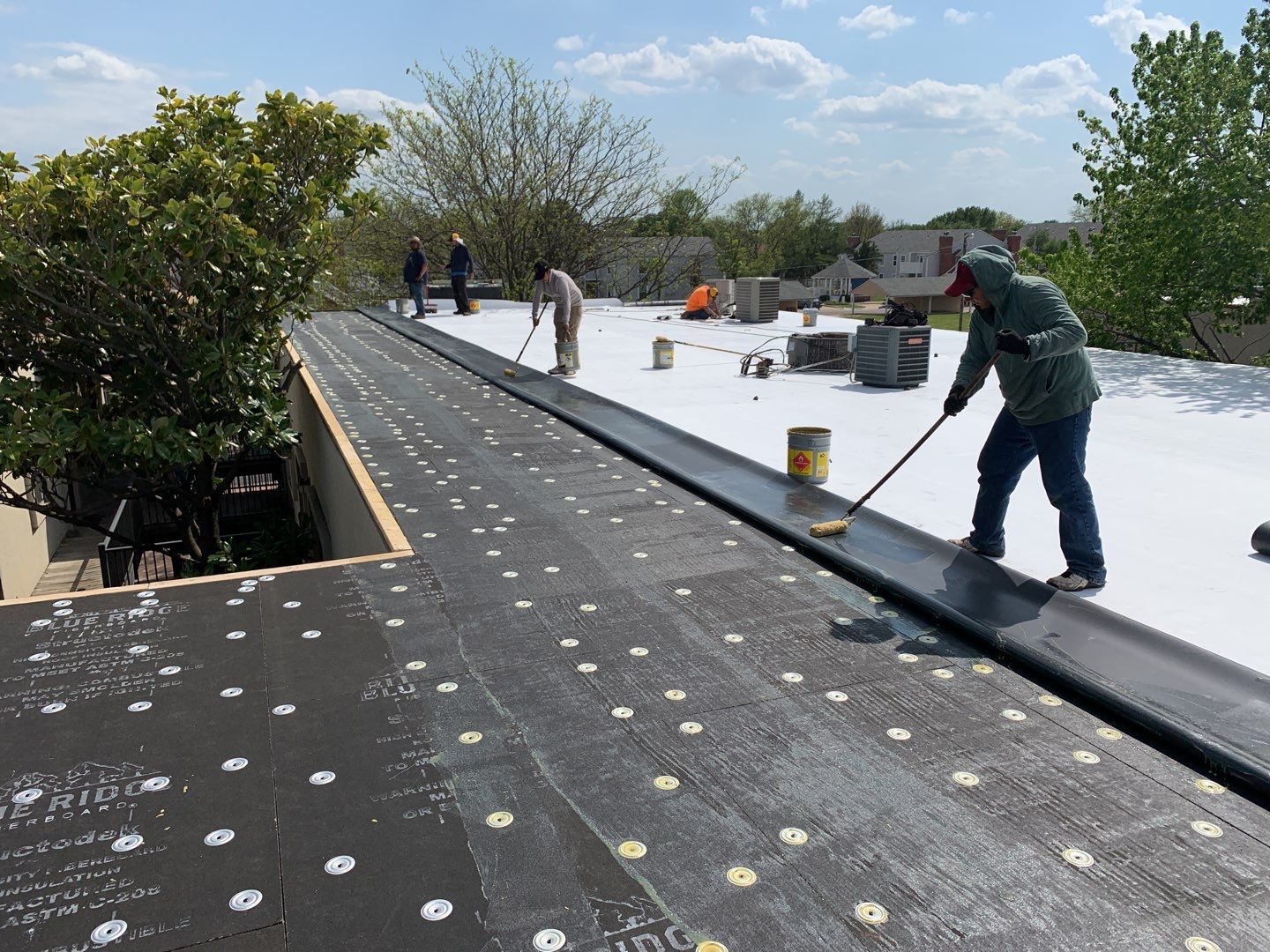 Mechanically Attached Vs Fully Adhered Roofing Systems - Rhoden Roofing LLC